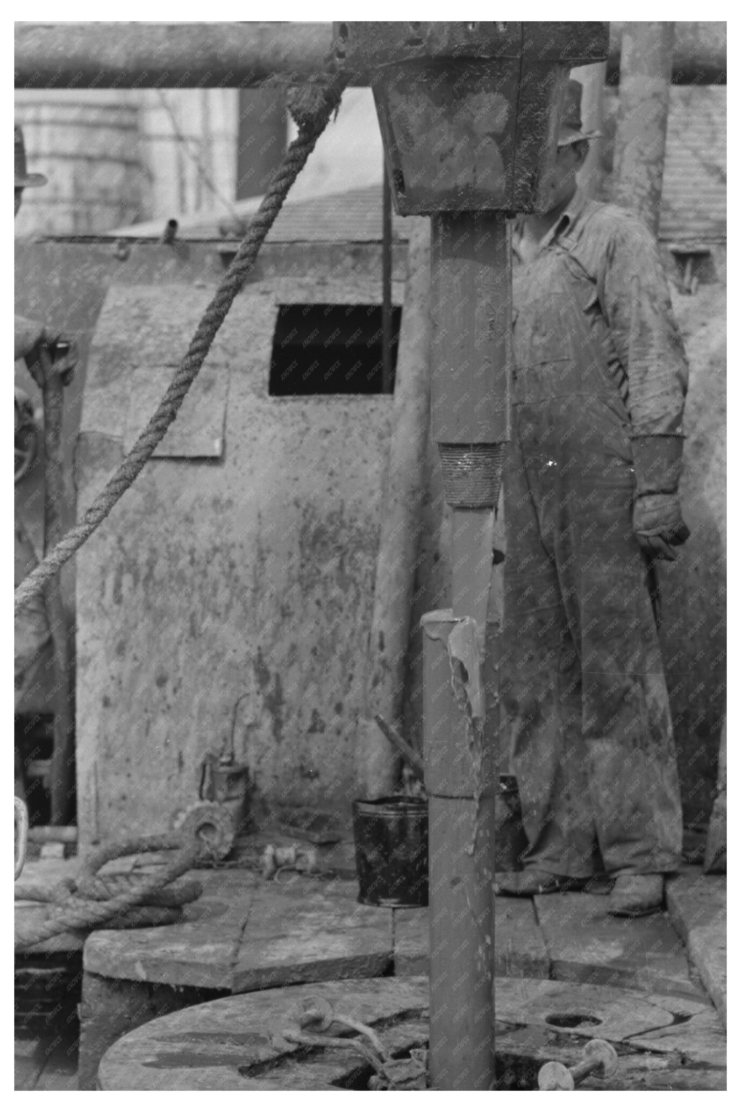 Roughnecks Operating Bailer at Oklahoma Oil Well 1939 – KNOWOL